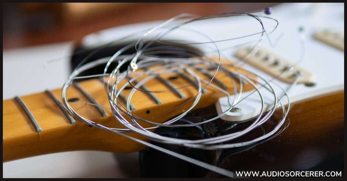 Roundwound Vs Flatwound: The Great Guitar String Debate - Audio Sorcerer
